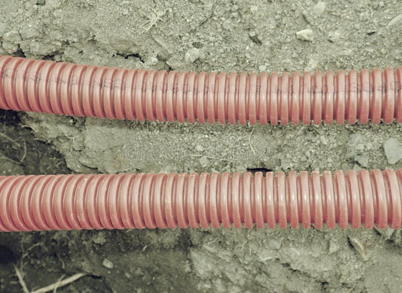 Wire in HDPE and Red Protectivep Pipe. Lines of Cables Stock Image ...