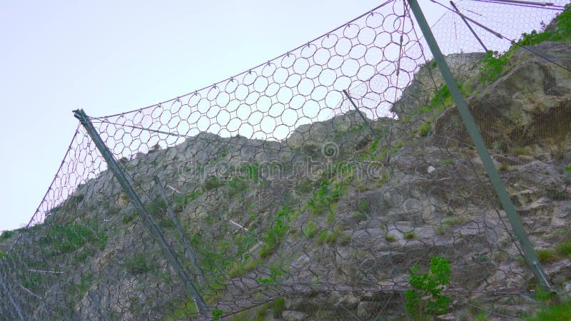 Wire Mesh on the Rocks of the Mountain Stock Video - Video of wall ...