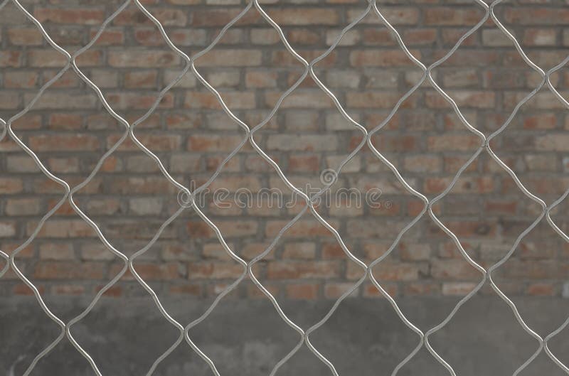 A Wire Net before a Brick Wall Stock Image - Image of wire, buildings ...