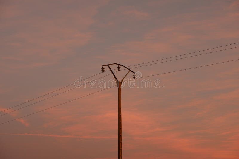 Wire Post with Sky in Red with Clouds Stock Photo - Image of cable ...