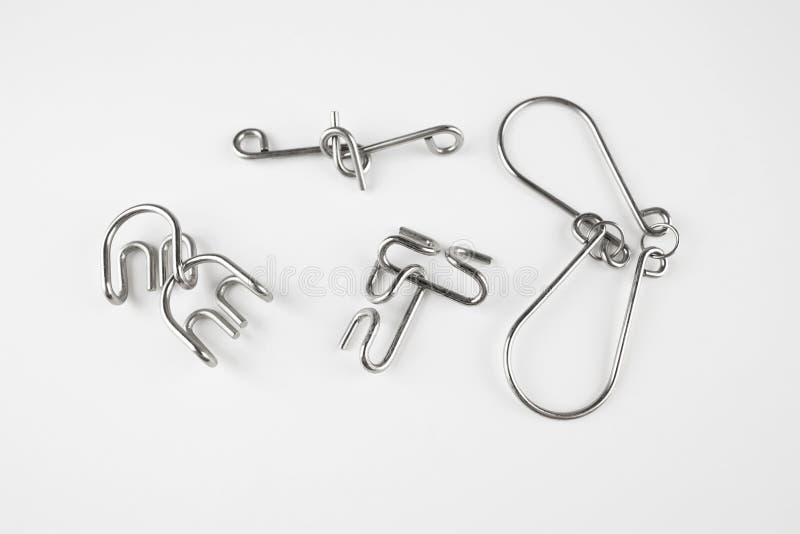 Wire Puzzles (Ring Puzzle) on White Background Stock Photo - Image of ...