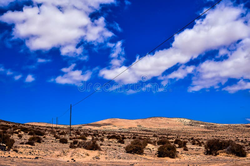 A Wire is Stretched Across a Desert Landscape Stock Photo - Image of ...