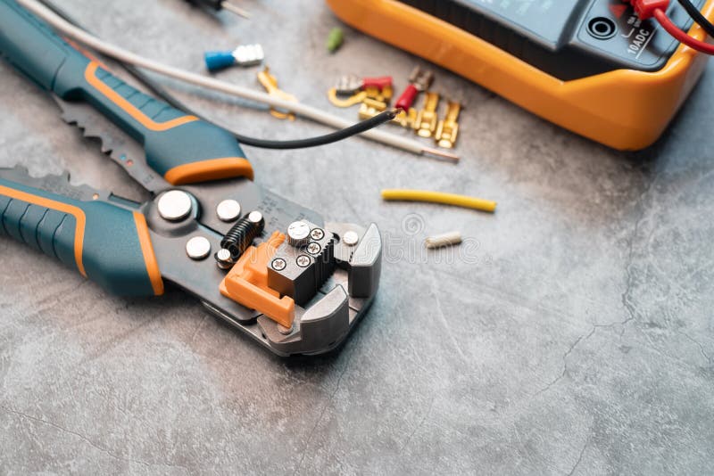 Wire Strippers or Cable Strippers Tool on Desk. Electrical Tools ...