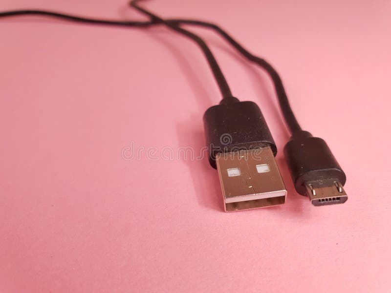 Wire with USB Connector and Micro Usb Closeup on Pink Background Stock ...