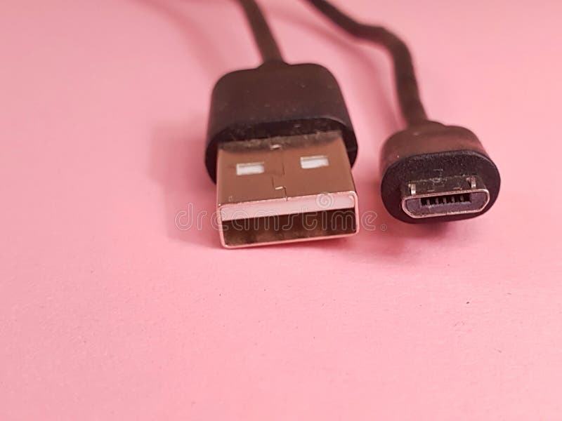 Wire with USB Connector and Micro Usb Closeup on Pink Background Stock ...