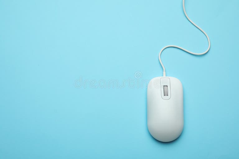 Wired Computer Mouse on Light Blue Background. Space for Text Stock ...