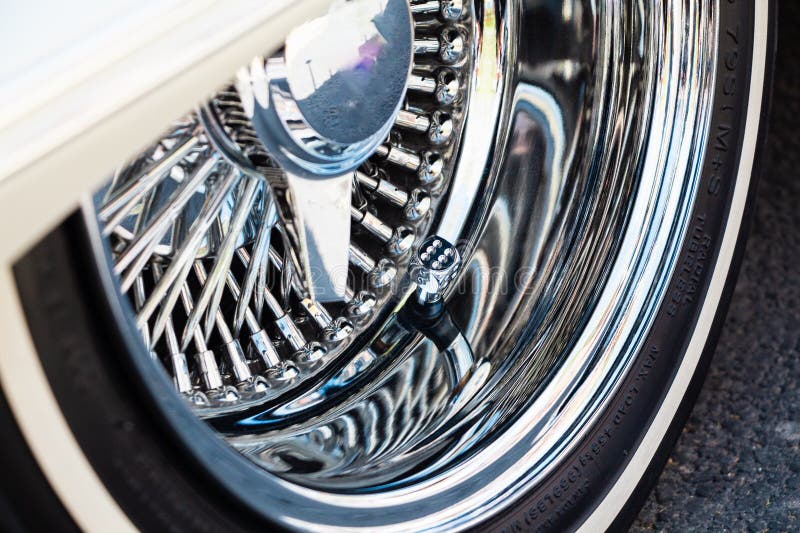 Wired Spoke Chrome Rim on White Stripe Wheel on a Low Rider Car Stock ...