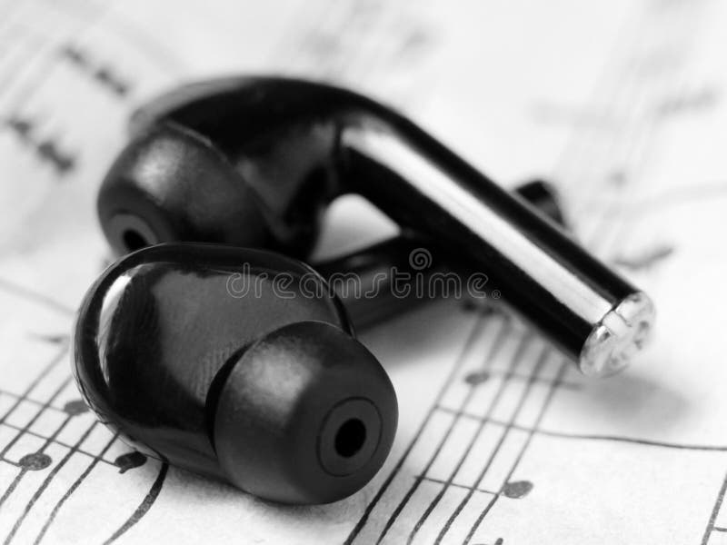 Wireless Bluetooth Earphone and Musical Notes Stock Image - Image of ...