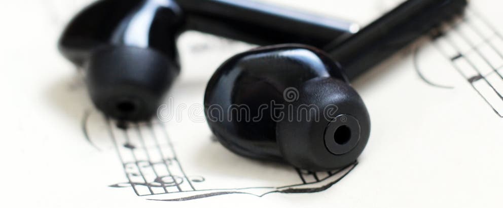 Wireless Bluetooth Earphone and Musical Notes Stock Photo - Image of ...