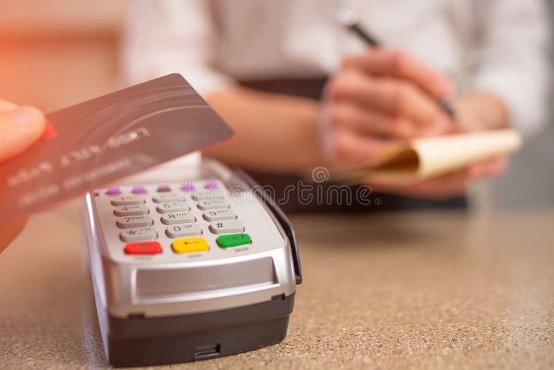 Wireless Card Payment through the Terminal for Services Stock Photo ...