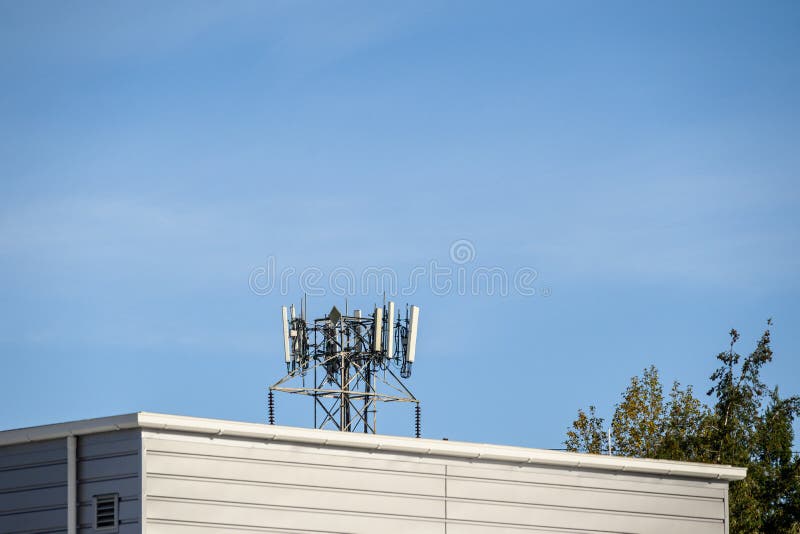 Wireless Communication Panel Antennas Mounted on a Commercial Rooftop ...