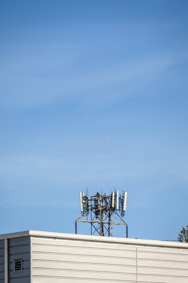 Wireless Communication Panel Antennas Mounted on a Commercial Rooftop ...