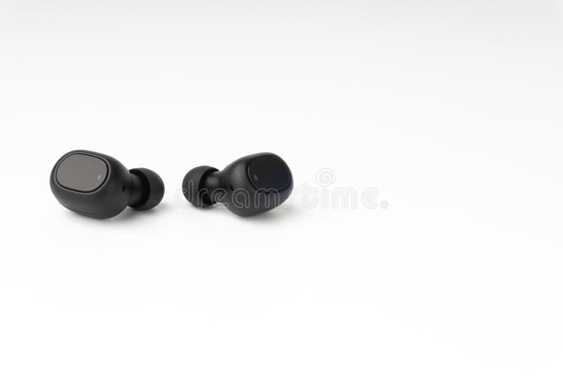 Wireless Earbuds or Earphones on White Background. Copy Space and ...