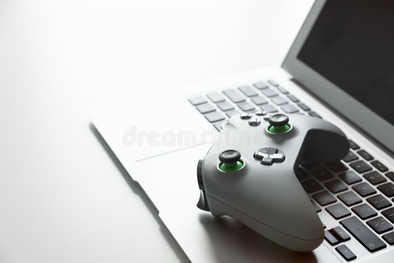 Wireless Game Pad Controller on Laptop Keyboard Stock Image - Image of ...