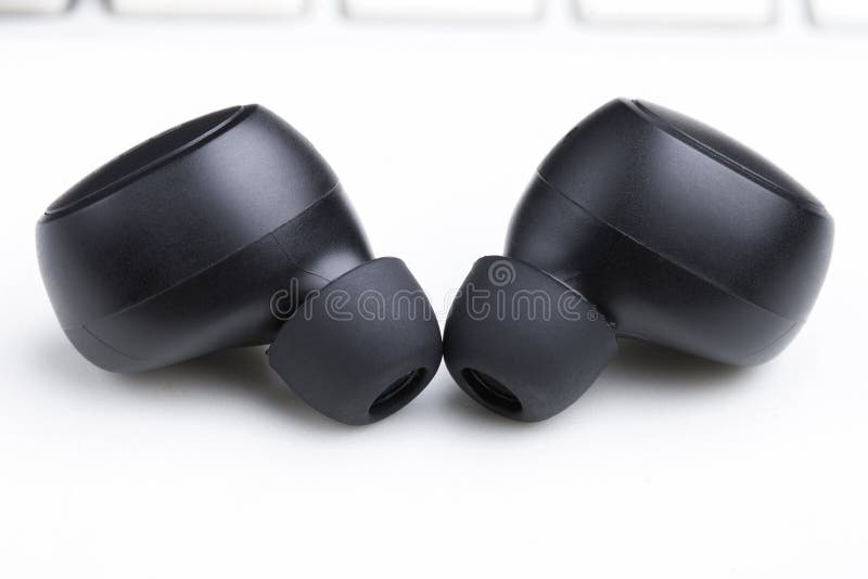 Wireless Headphones on a White Background. Wireless Headset Closeup ...