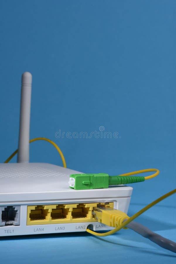 Wireless Router with Network Patch Cord and Optical Cable Stock Photo ...