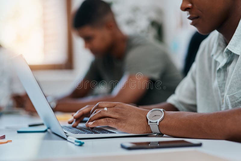 Wireless Tech Gets the Work Done. a Businessman Using a Computer in a ...