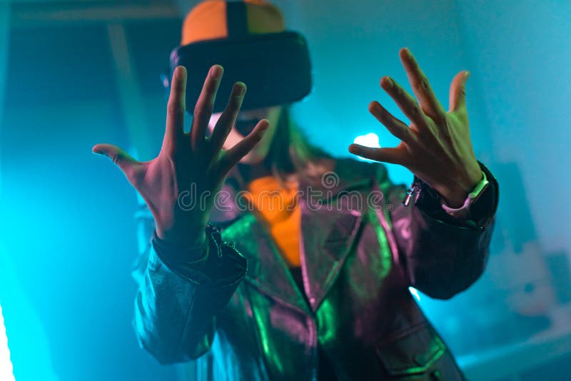 Wireless Technologies. Young Woman Using Virtual Reality Glasses in the ...