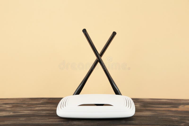 Wireless Wi-Fi Router on Brown Background with Copy Space Stock Photo ...