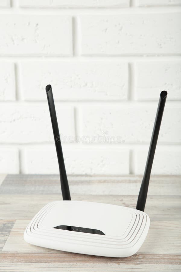 Wireless Wi-Fi Router on a White Background. Vertical Photo Stock Photo ...