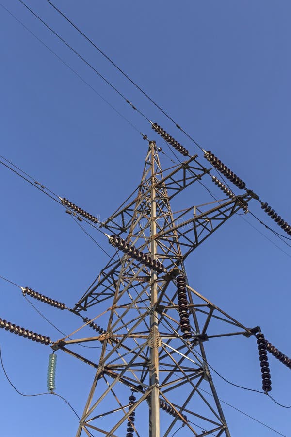 Wires and Electricity Pylon Against Blue Sky Stock Photo - Image of ...