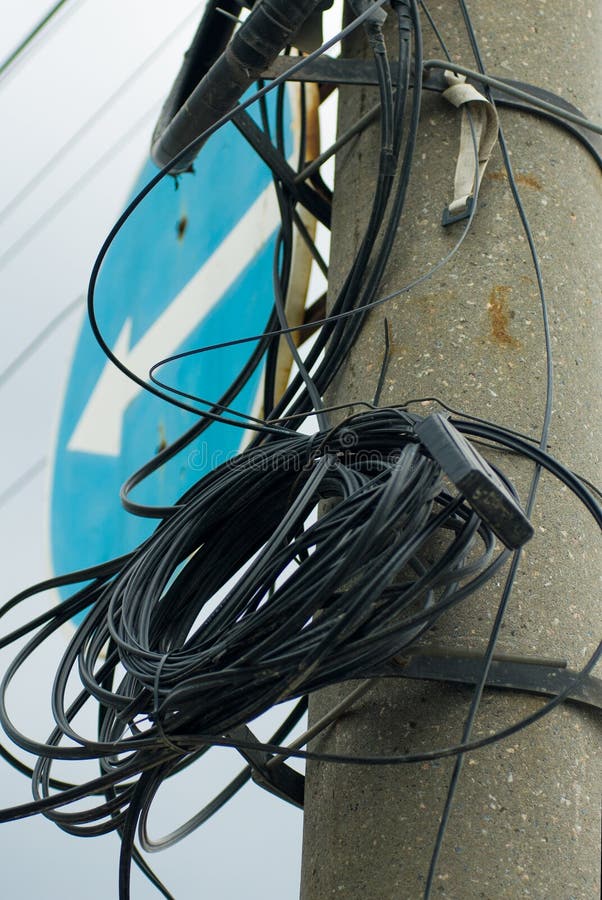 Wires on Pillar with Road Sign Stock Image - Image of mess, cable: 95458691