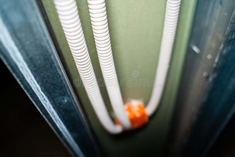 The Wires in the Protective Corrugated Pipe are Led Inside the Socket ...