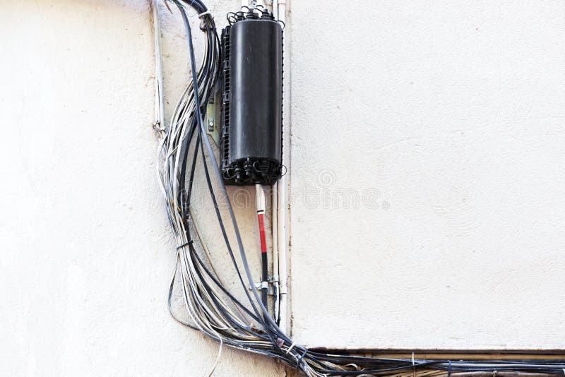 Wires on a white wall stock image. Image of appliance - 69217003
