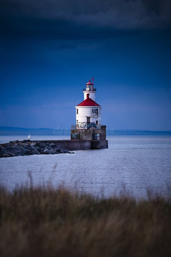 Wisconsin Point Lighthouse before the Storm Stock Image - Image of lake ...
