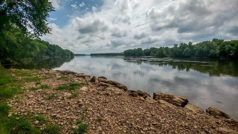 The Wisconsin River with Spring Trees and Rocky Shoreline Stock Image ...