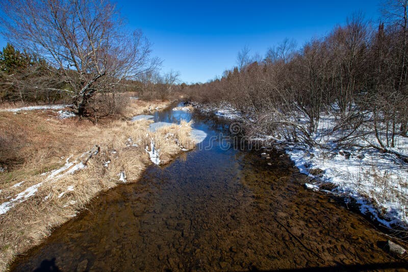 Wisconsin Stream and Forest with a Little Snow Stock Image - Image of ...