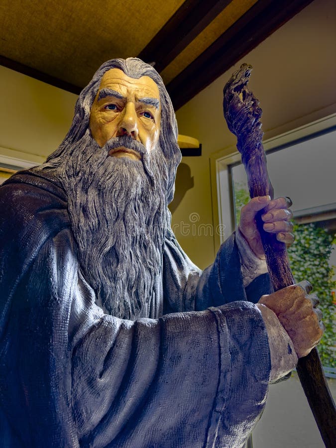 Wise Wizard Statue with Staff Editorial Stock Photo - Image of robe ...