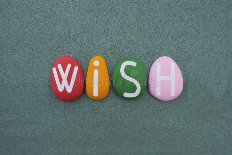 Wish, Creative Text Composed with Multi Colored Stone Letters Over ...