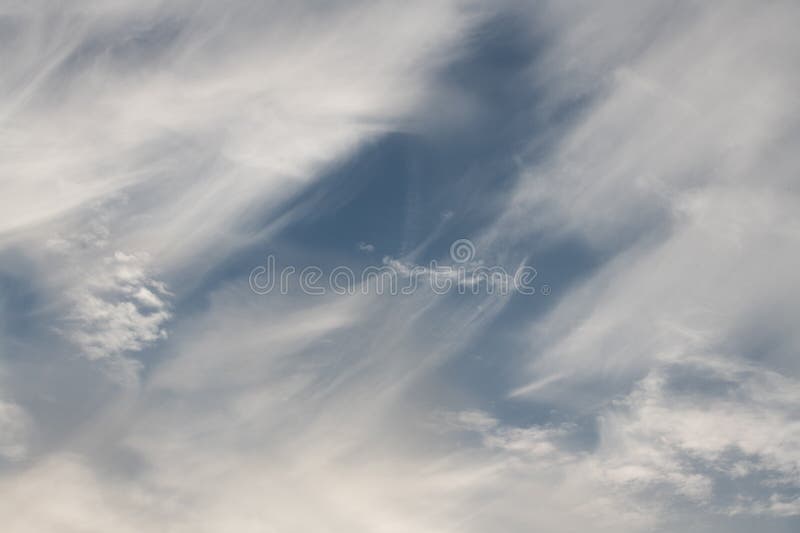 Wispy Cirrus Clouds Creating Feathery Patterns in Blue Sky Stock Photo ...