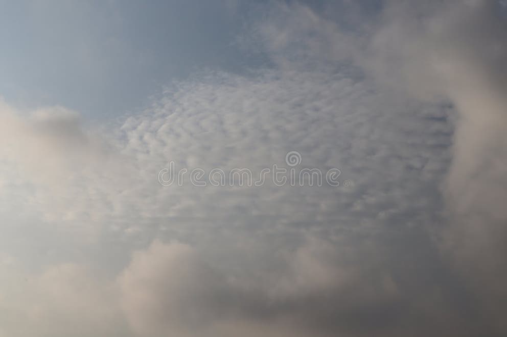 Wispy Clouds in a Blue Sky, with a Central Patch of Stratocumulus ...