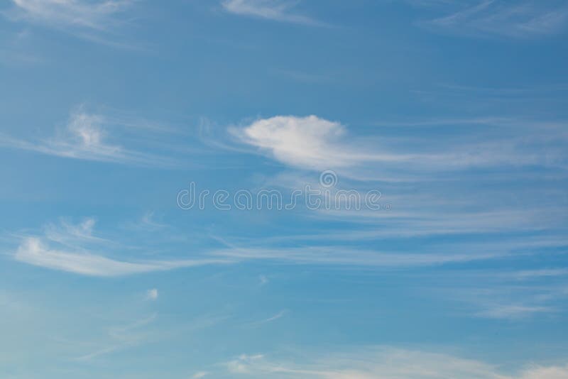 Wispy clouds in a blue sky stock image. Image of north - 255562955
