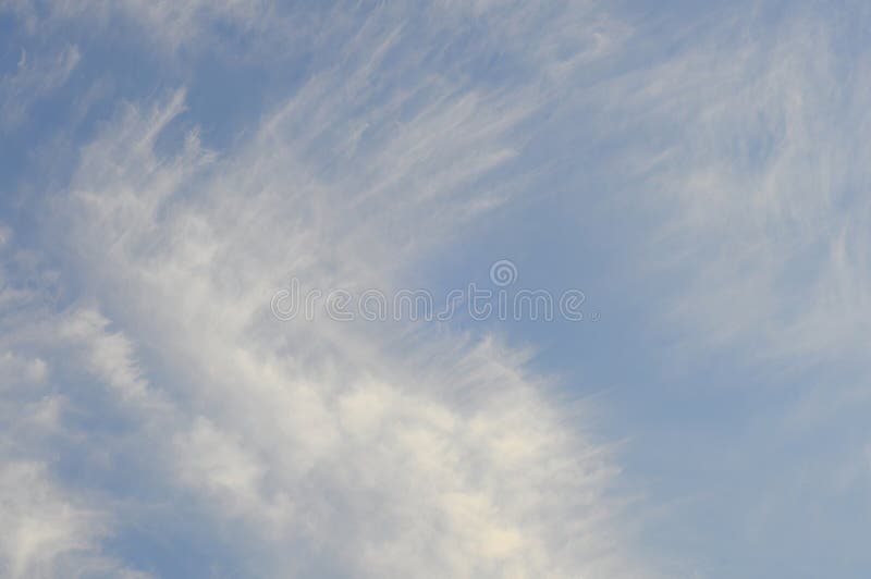 Wispy Clouds in a Blue Sky stock image. Image of clear - 366208765