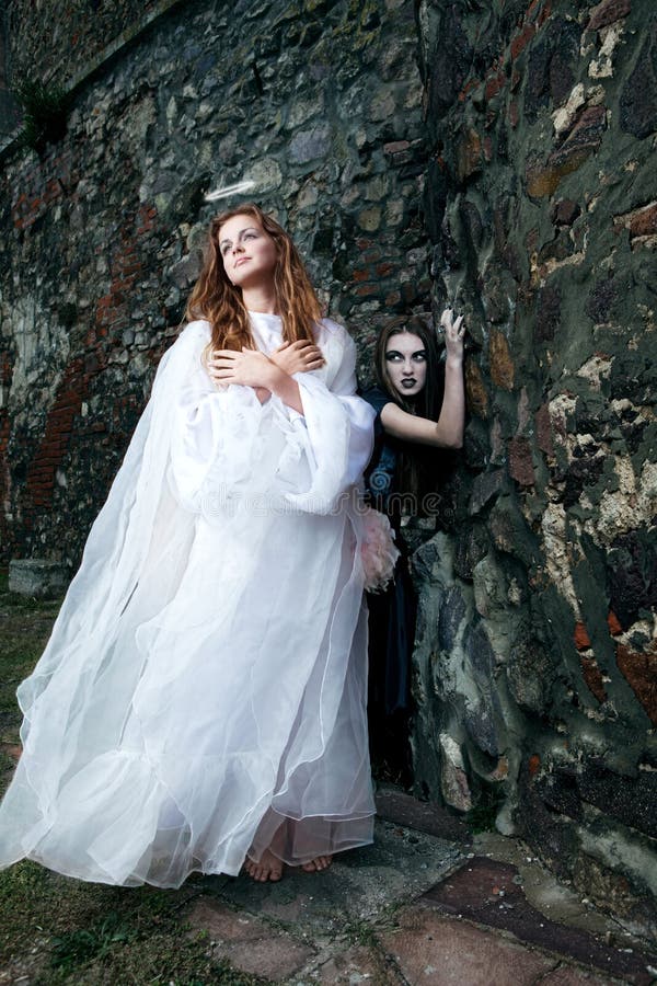 Witch and angel stock photo. Image of costume, fantasy - 21231870