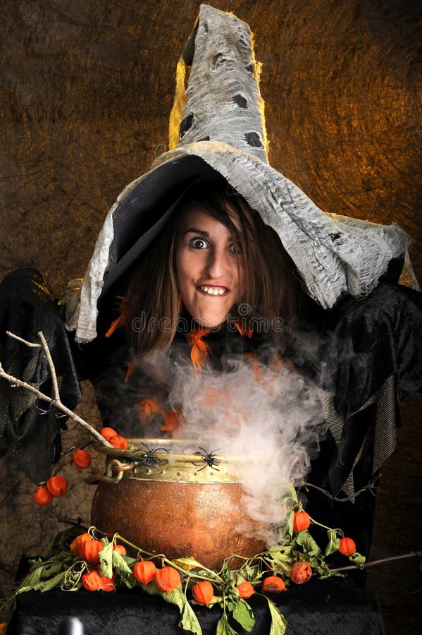 Witch Cooking in a Copper Cauldron Stock Photo - Image of expression ...