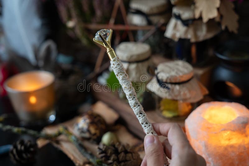 Witch Hand Holds Magic Wand. Magic Items Scene Stock Image - Image of ...