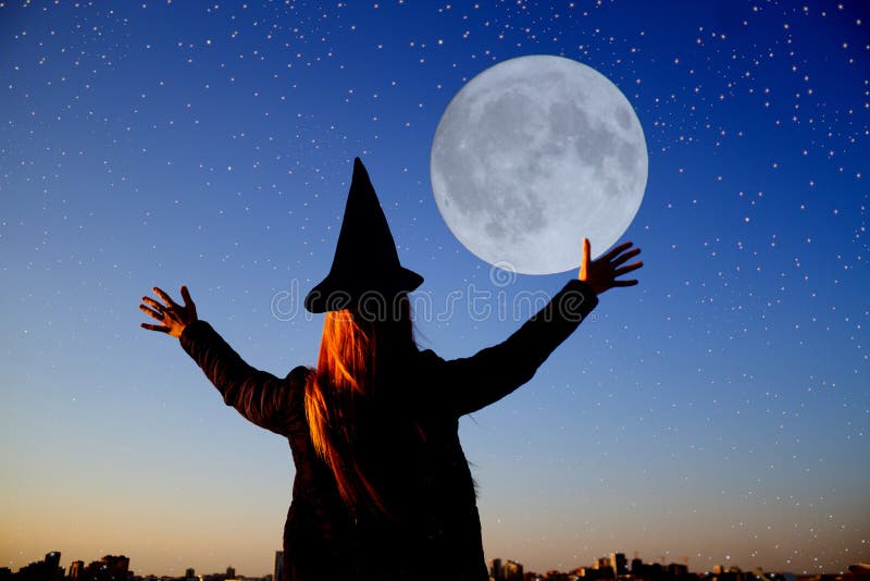 Levitation: The Witch Reads A Book Hanging Over The Ground, A Ho Stock ...