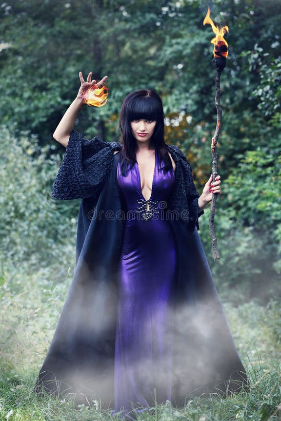 Witch holding a fireball stock photo. Image of fire, energy - 75898180
