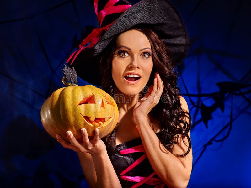 Witch holding pumpkin stock photo. Image of thanksgiving - 59460440