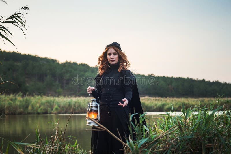 Witch with Light on a Swamp Stock Photo - Image of mystical, people ...
