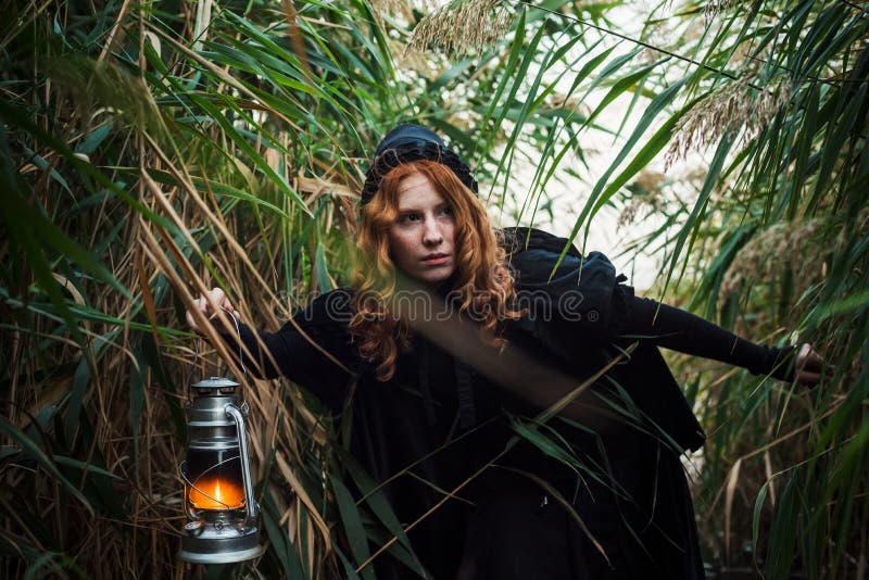 Witch with Light on a Swamp Stock Image - Image of beauty, person: 81022959