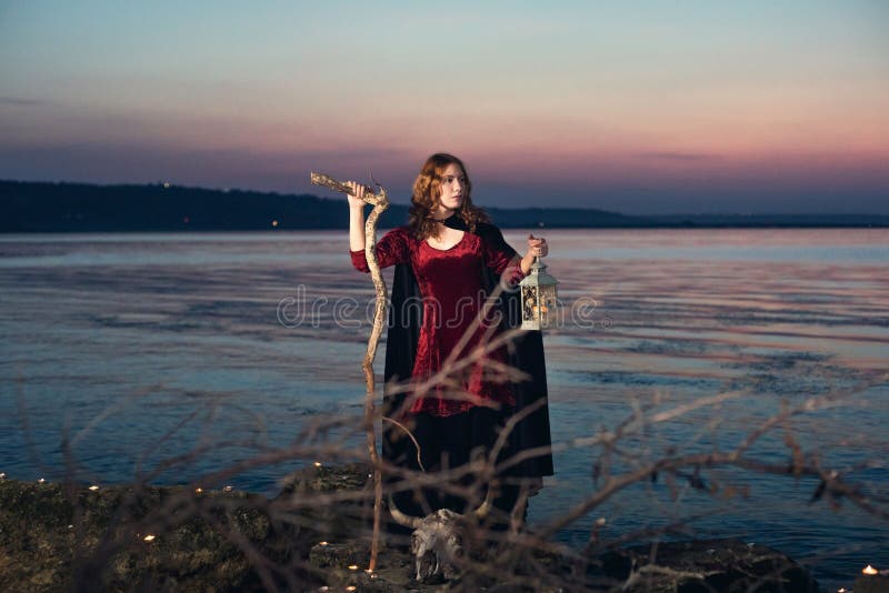 Witch with Light on a Swamp Stock Photo - Image of female, green: 81023328