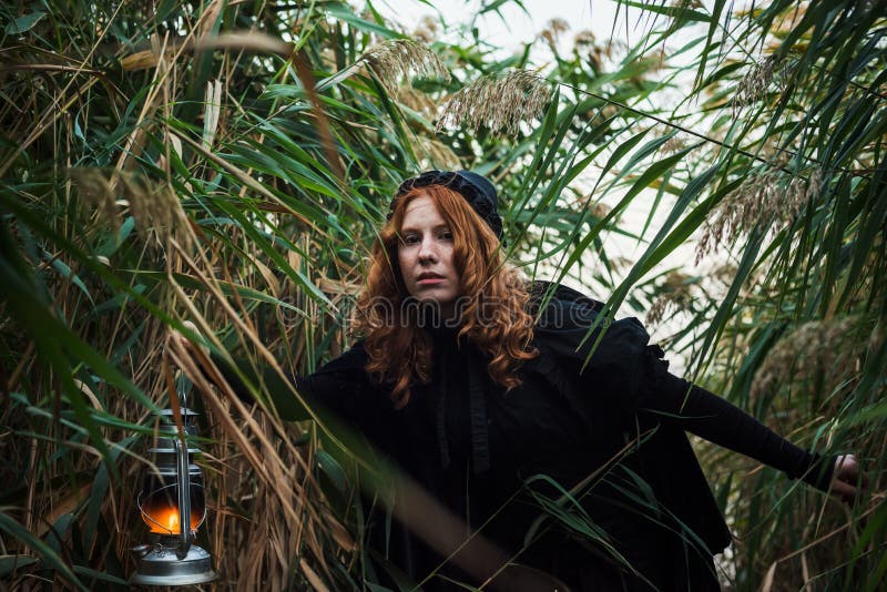 Witch With Light On A Swamp Stock Image - Image of witch, person: 81023505