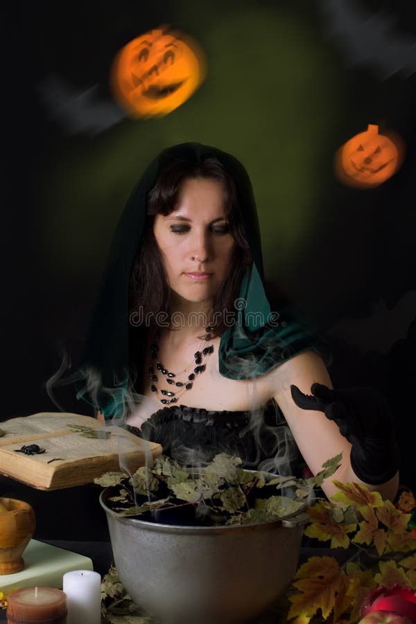 Witch Making Magic with Book Stock Photo - Image of night, holiday ...