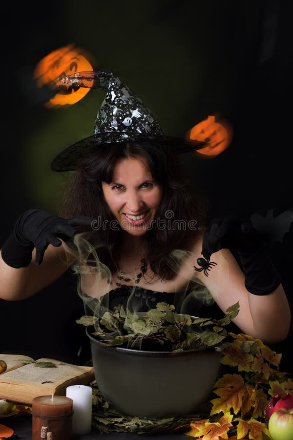 Pretty Witch Making Magic on Halloween Stock Image - Image of lantern ...