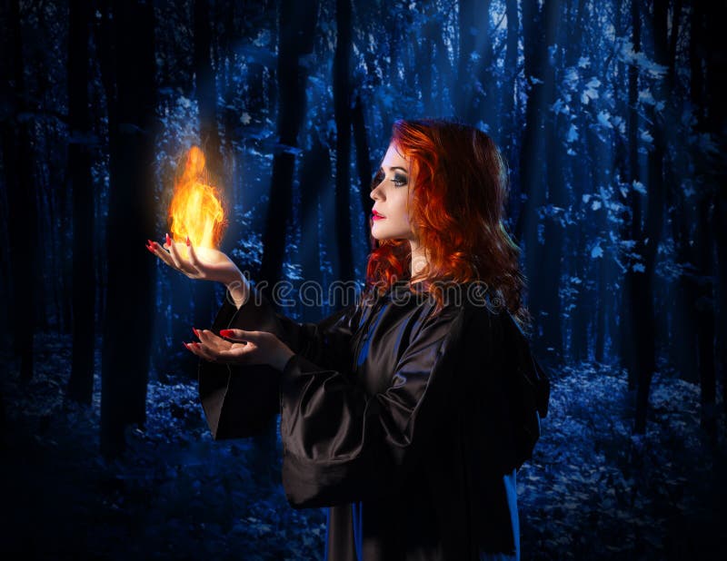 Witch in the Moonlight Forest with Flame Stock Image - Image of human ...
